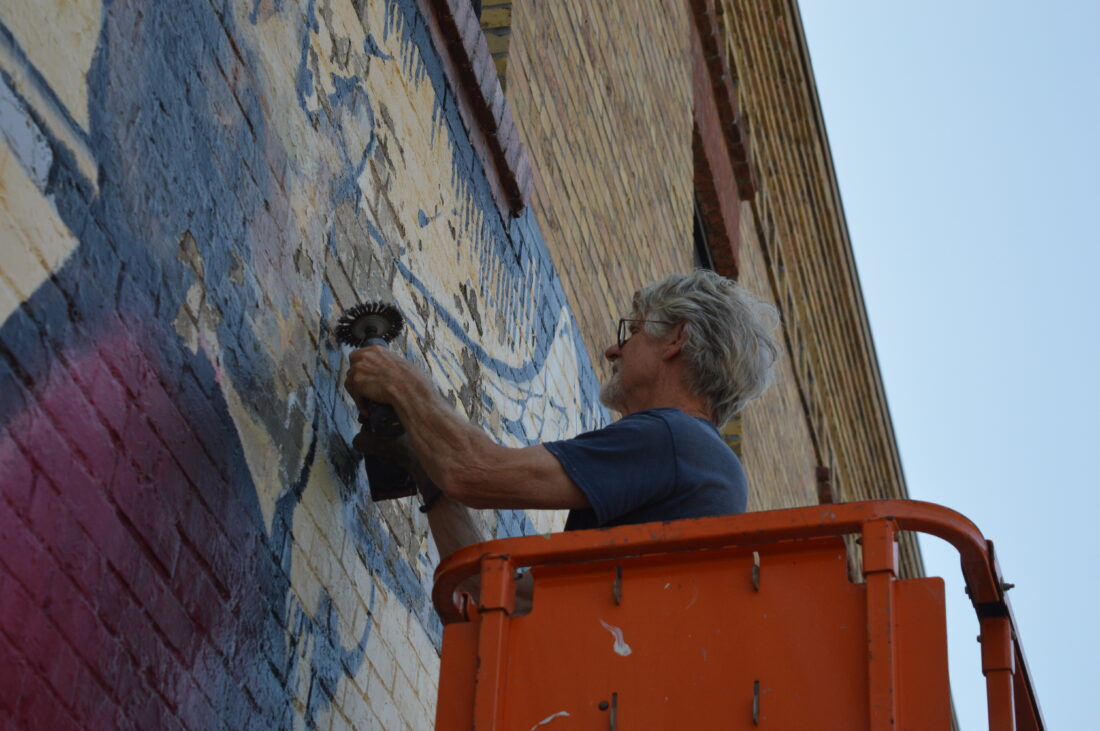 A touch-up for a downtown mural | News, Sports, Jobs - Marshall Independent